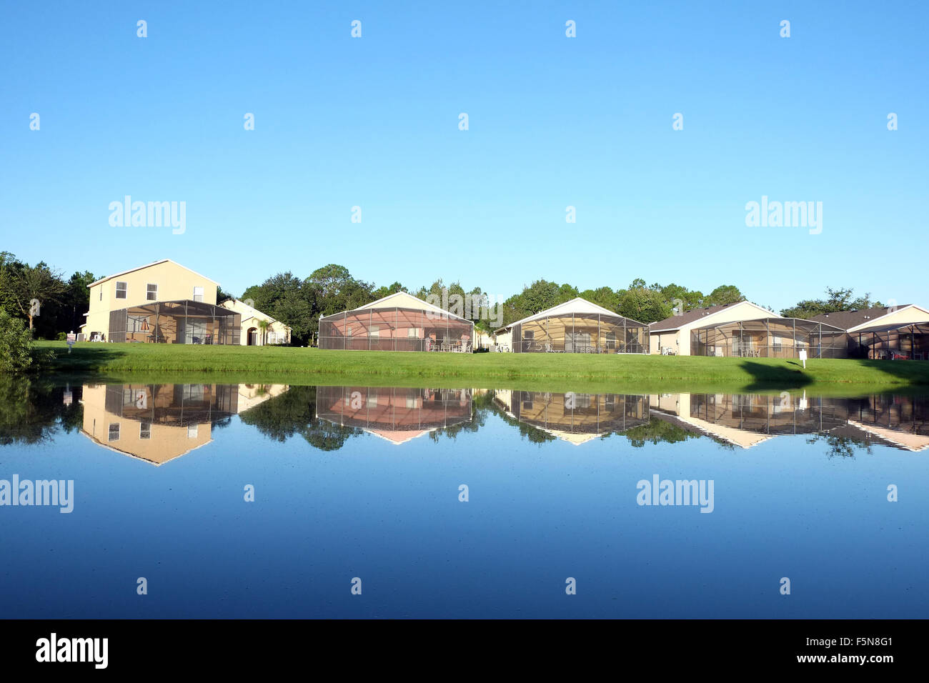 Reflected holiday rental homes on the Sand Ridge development near ...