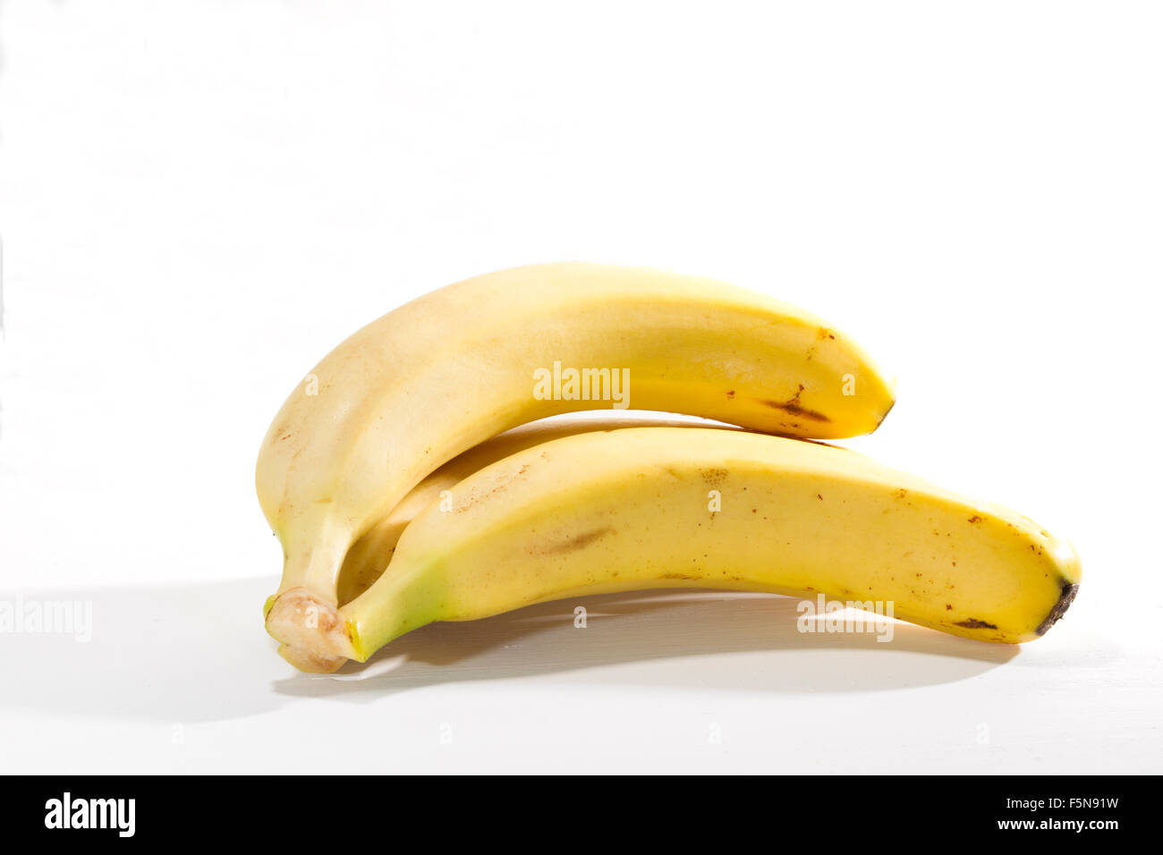 bananas from Canary islands on white background, cavendish variety ...