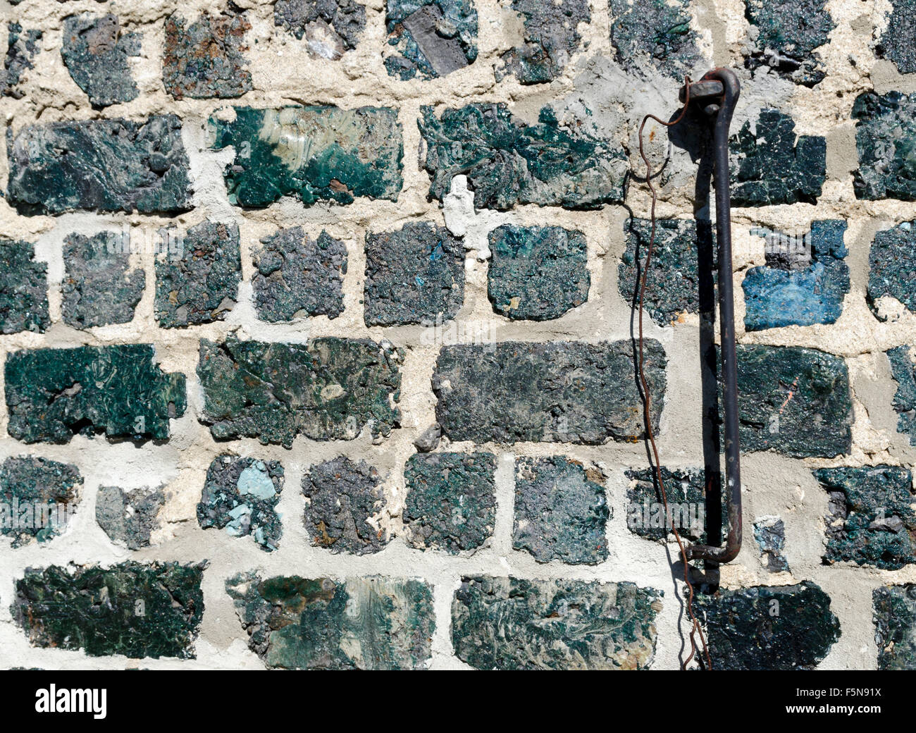Brick wall made of iron slag in a ironwork from the North of Sweden ...