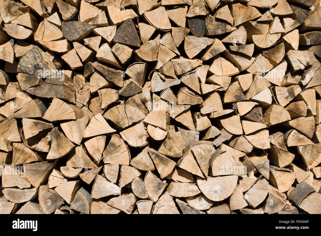 Background of firewood ready for the upcoming winter Stock Photo - Alamy