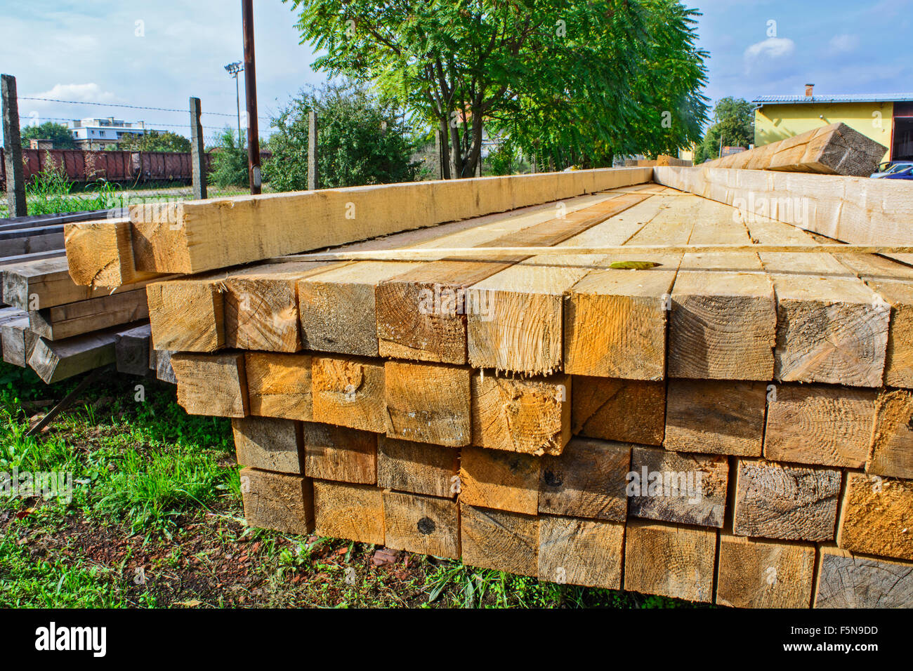 Wooden beams stacked in warehouses. The beams are used for roof ...