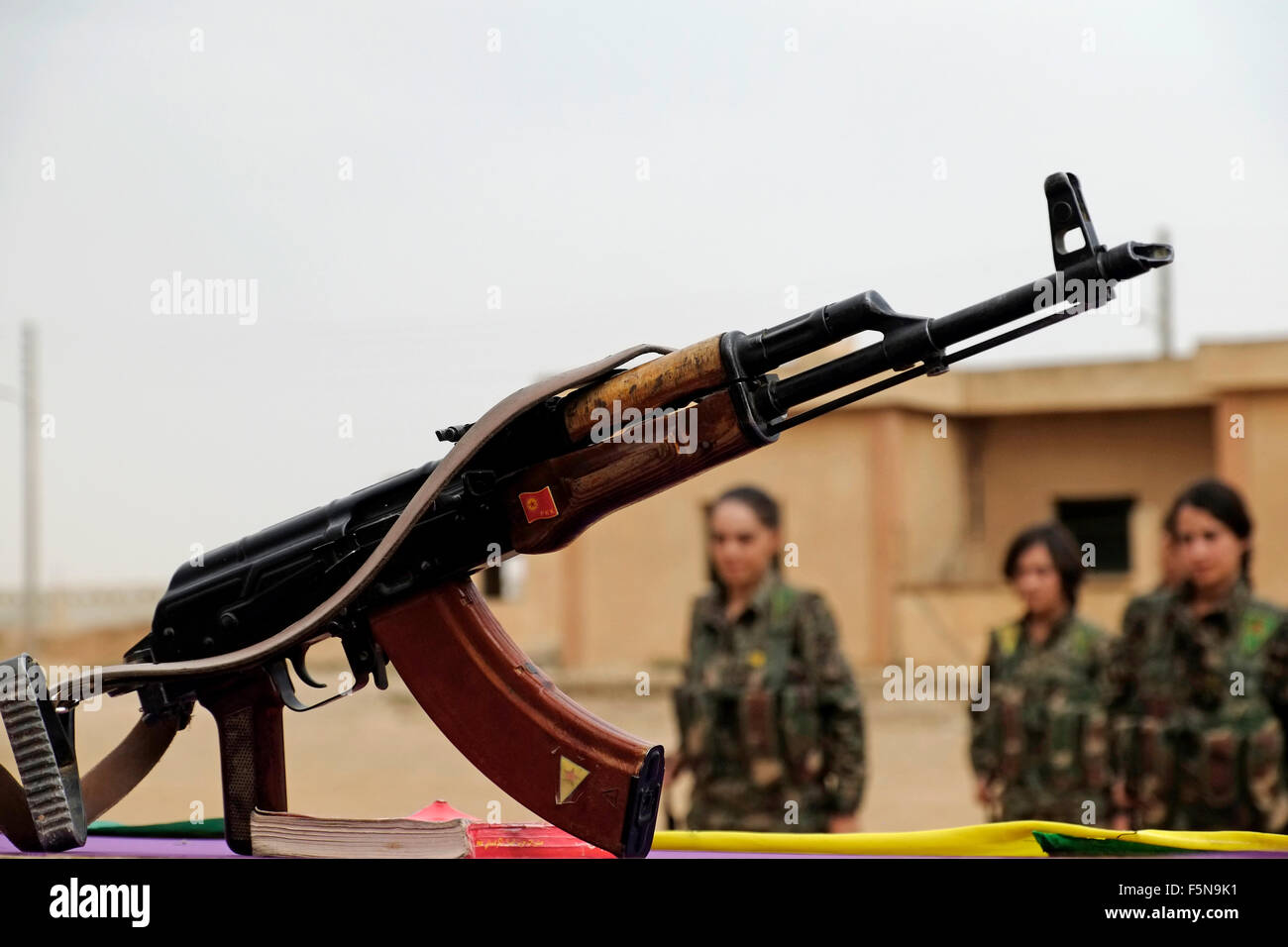 A Kalashnikov ak-47 rifle placed on a table during swearing ceremony of ...