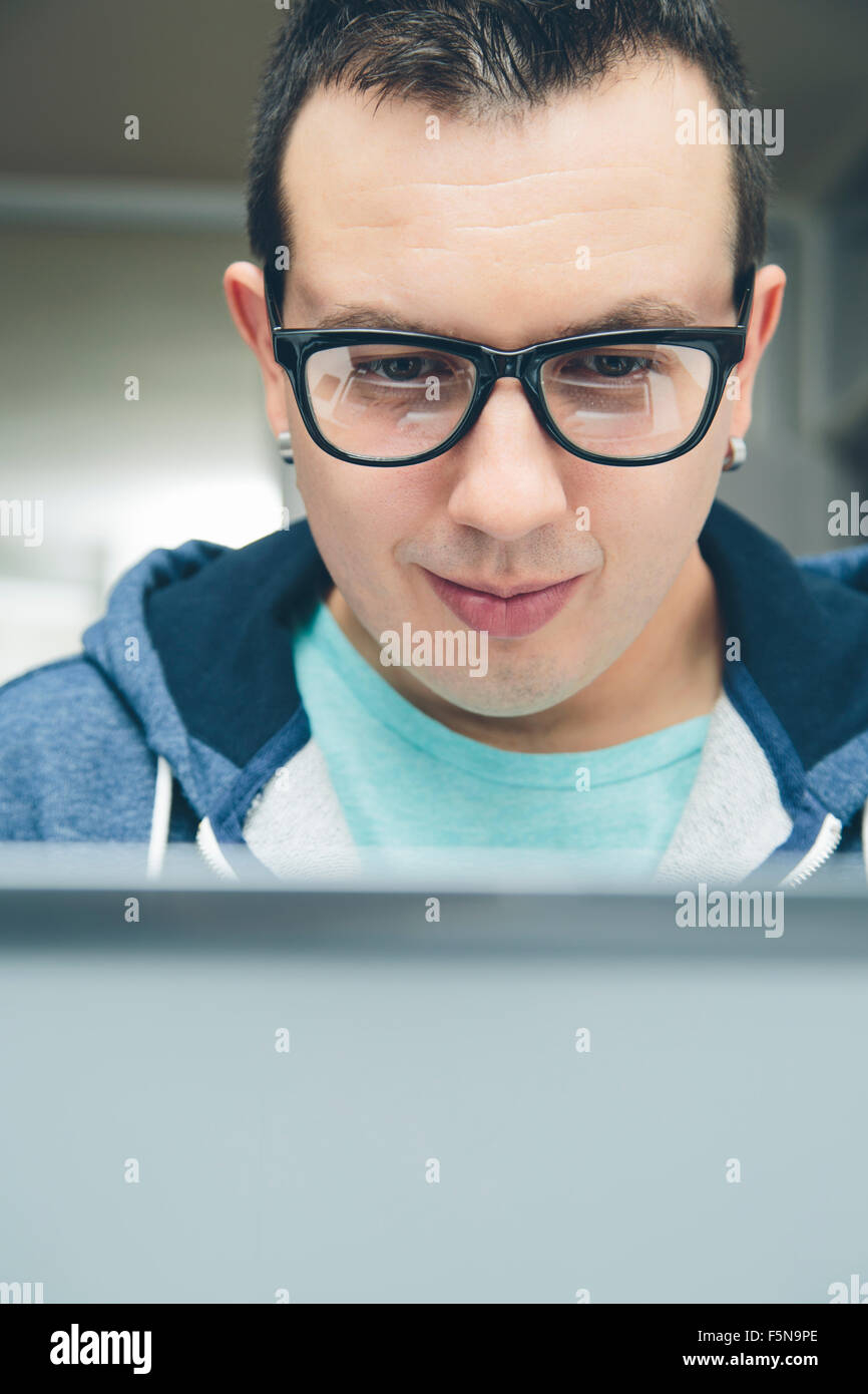 Guy working on computer hi-res stock photography and images - Alamy