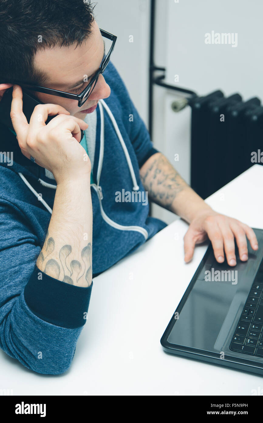 Man hands laptop programming hi-res stock photography and images - Alamy