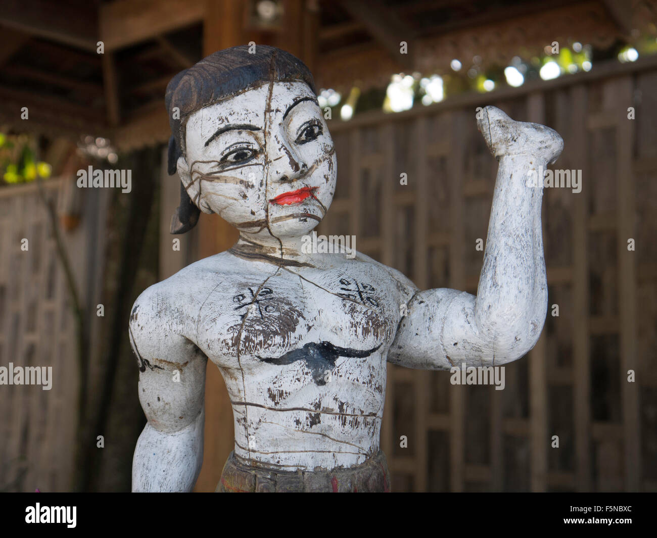 Thai wooden painted sculpture of male figure showing upper torso ,face ...