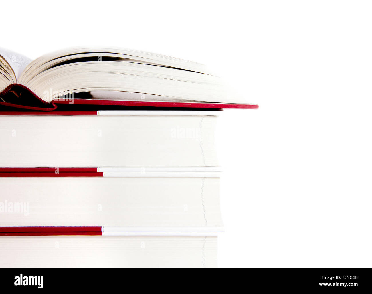 Open book on a stack of books isolated on a white background Stock ...