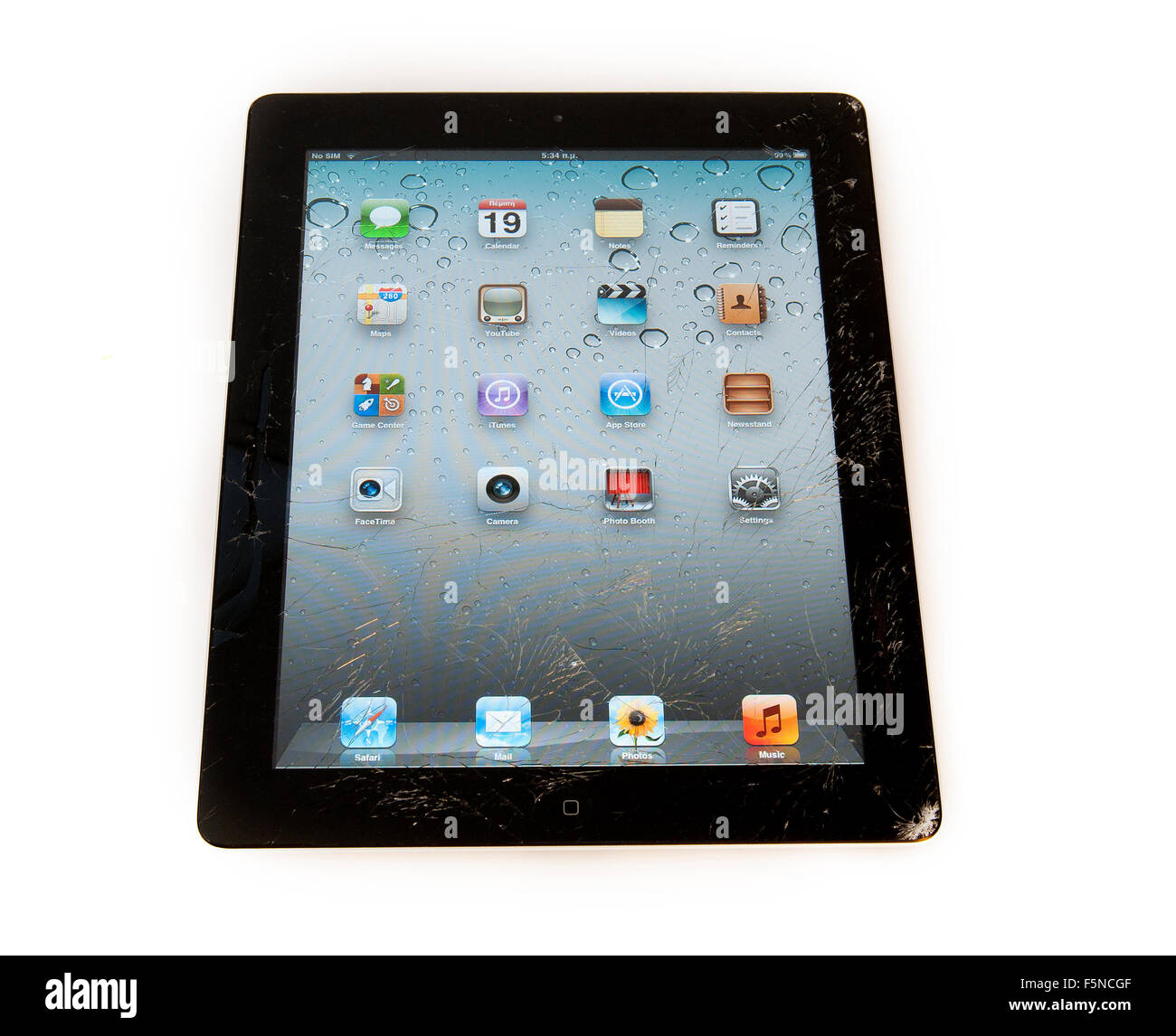 Front of a smashed Apple Ipad 2 digital tablet on a white background ...