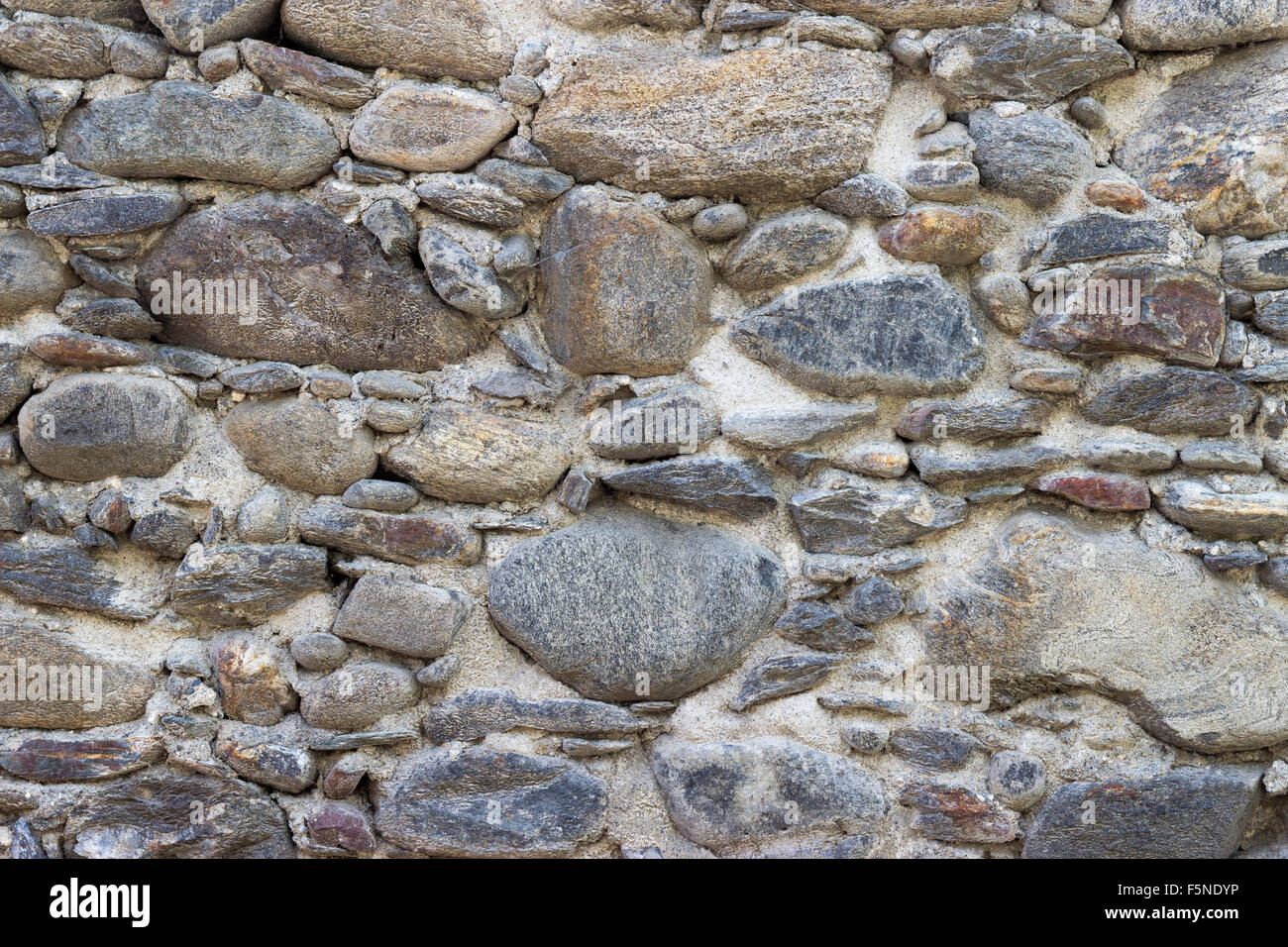 Background of stone wall texture photo Stock Photo - Alamy