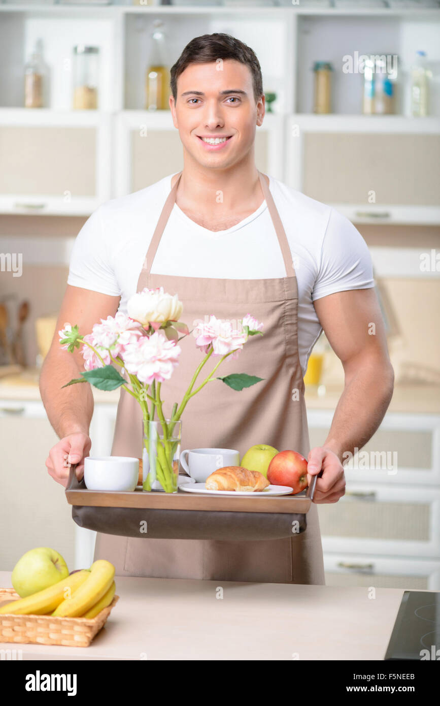 Man guy serving tray hi-res stock photography and images - Alamy
