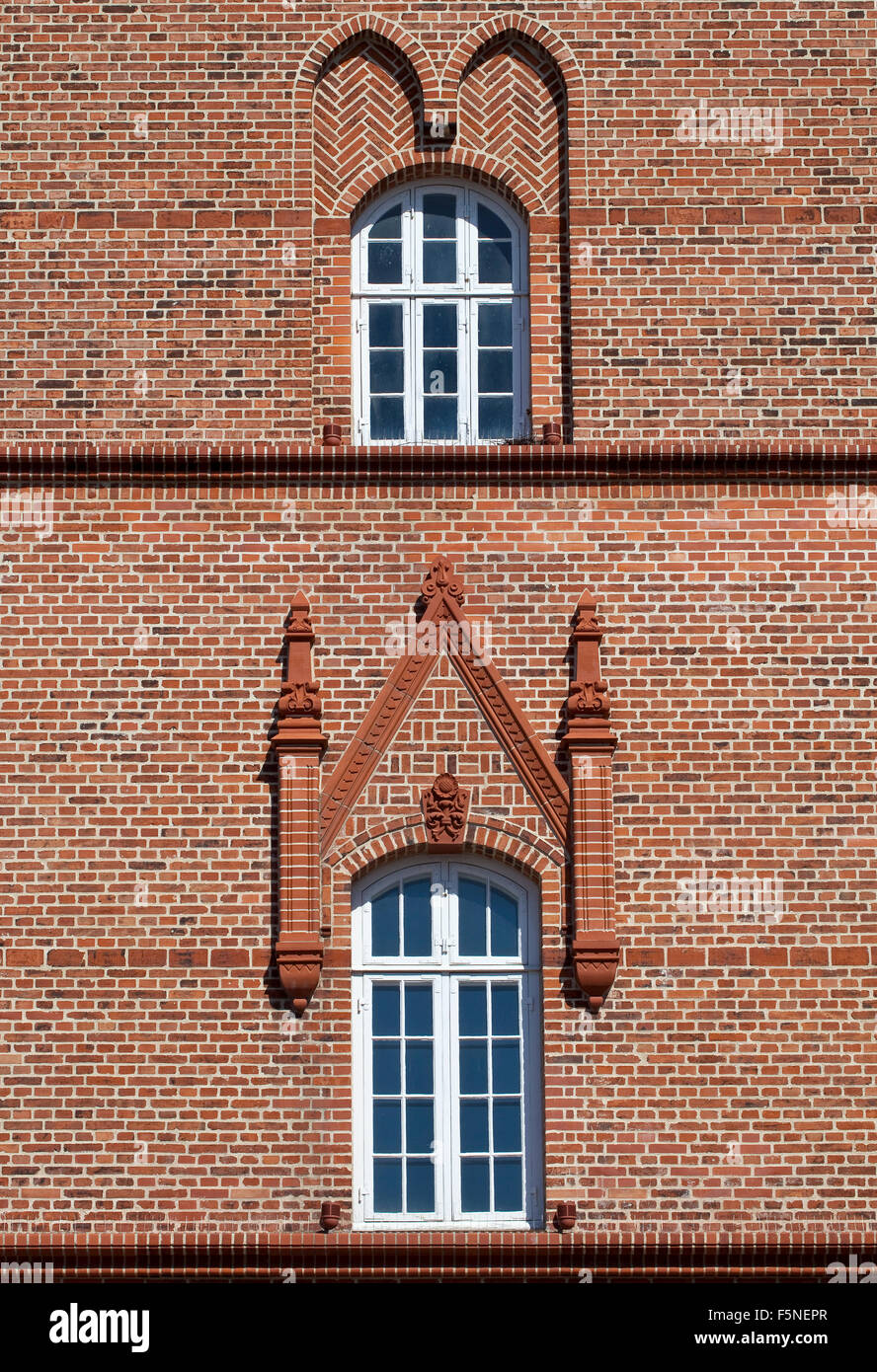 A simple and practical red brick building is taken from the ordinary by ...