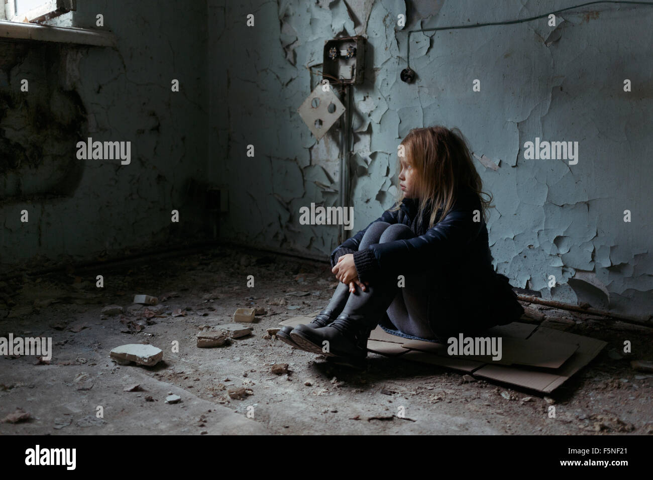 Hopeless girl sitting on floor hi-res stock photography and images - Alamy
