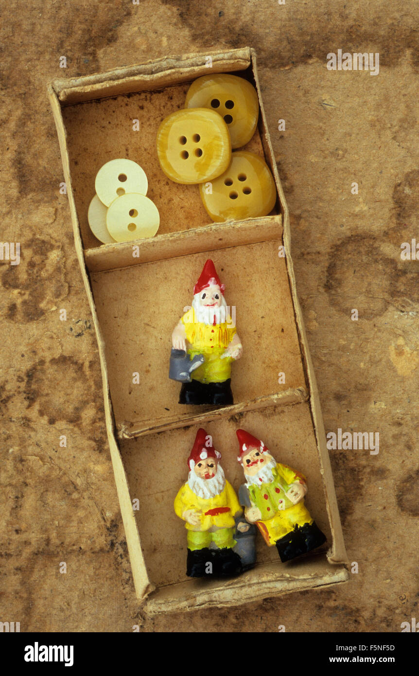 Small cardboard box with three compartments containing white and yellow ...
