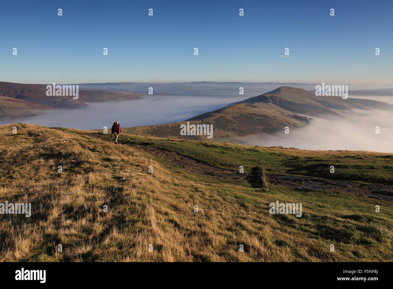 A walker on mam tor in the peak district Stock Photo - Alamy