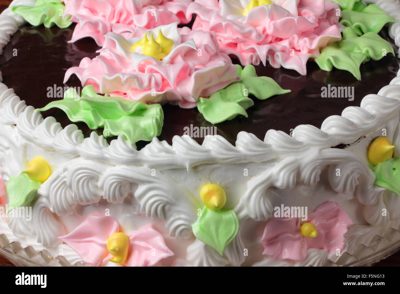 close-up of birthday cake with chocolate icing Stock Photo - Alamy