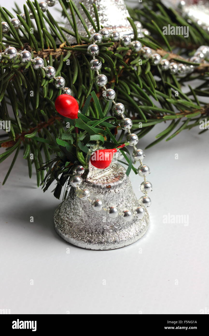 fir tree decorated with beads silver bell Stock Photo - Alamy