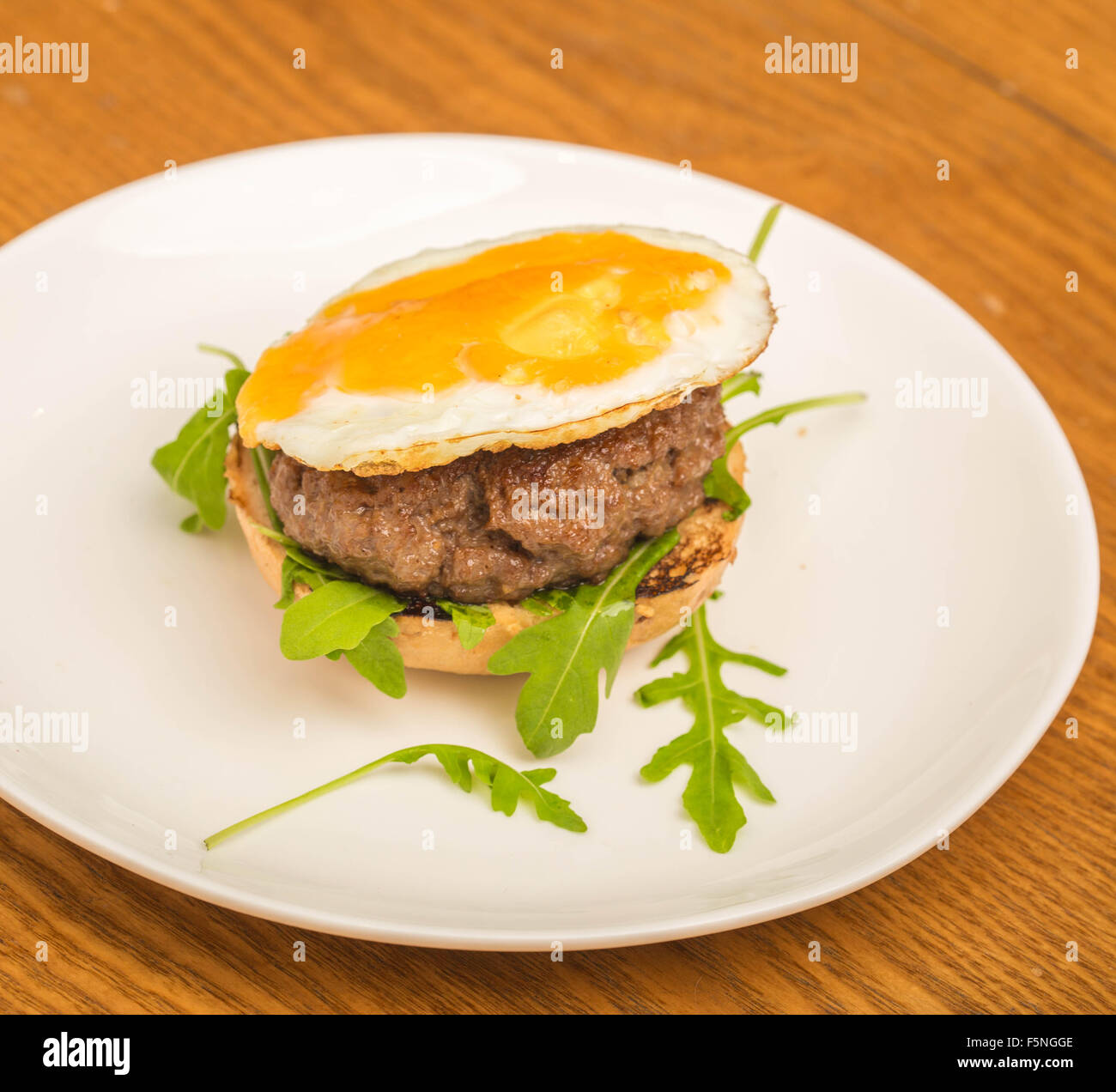 hamburger fast food with meat and egg Stock Photo - Alamy