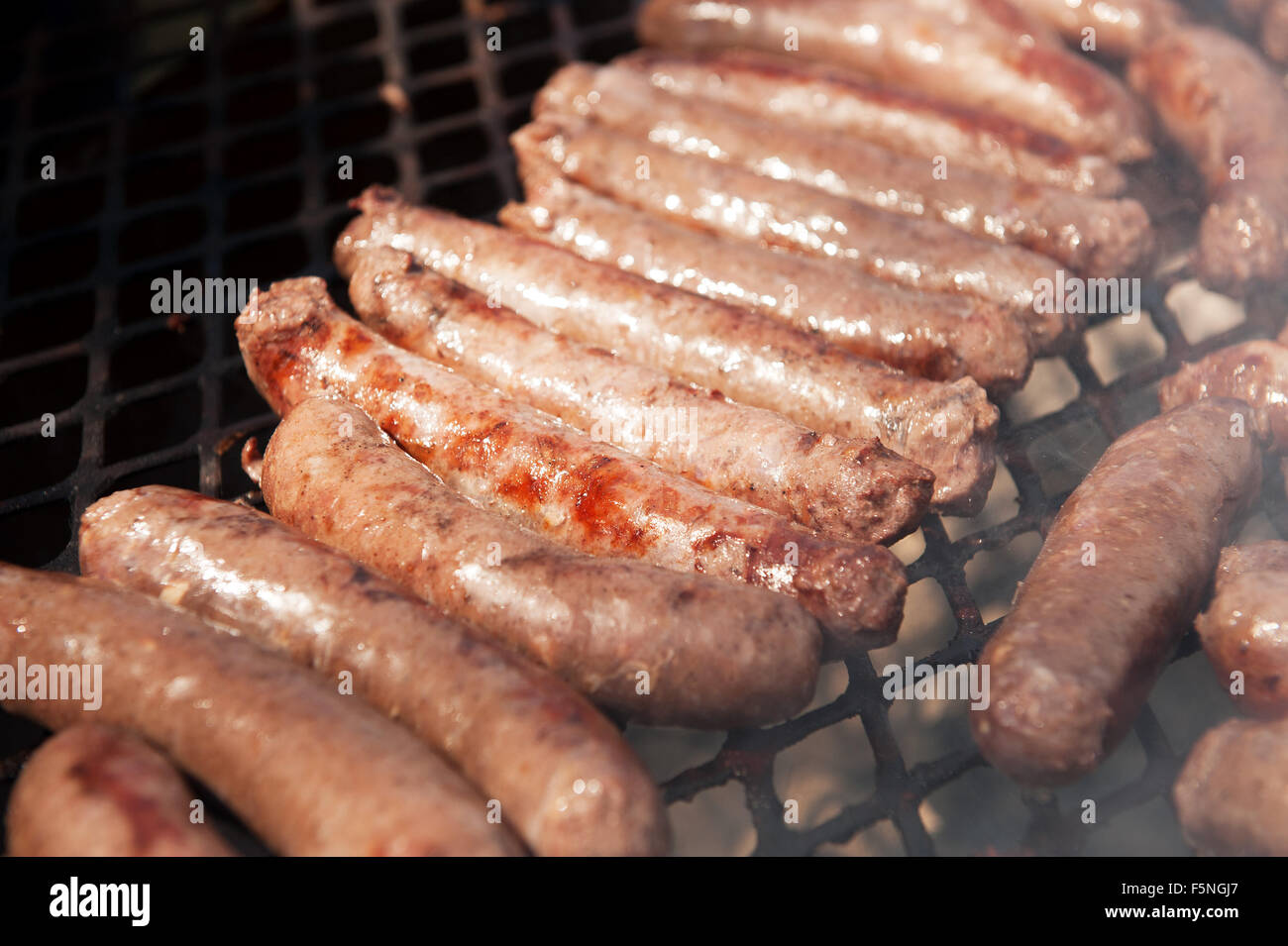 Traditional South African boervors sausages on a barbecue grill, or ...