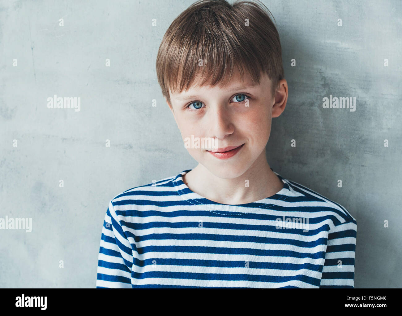 Cute boy happy beautiful child studio closeup portrait stripes sitting ...