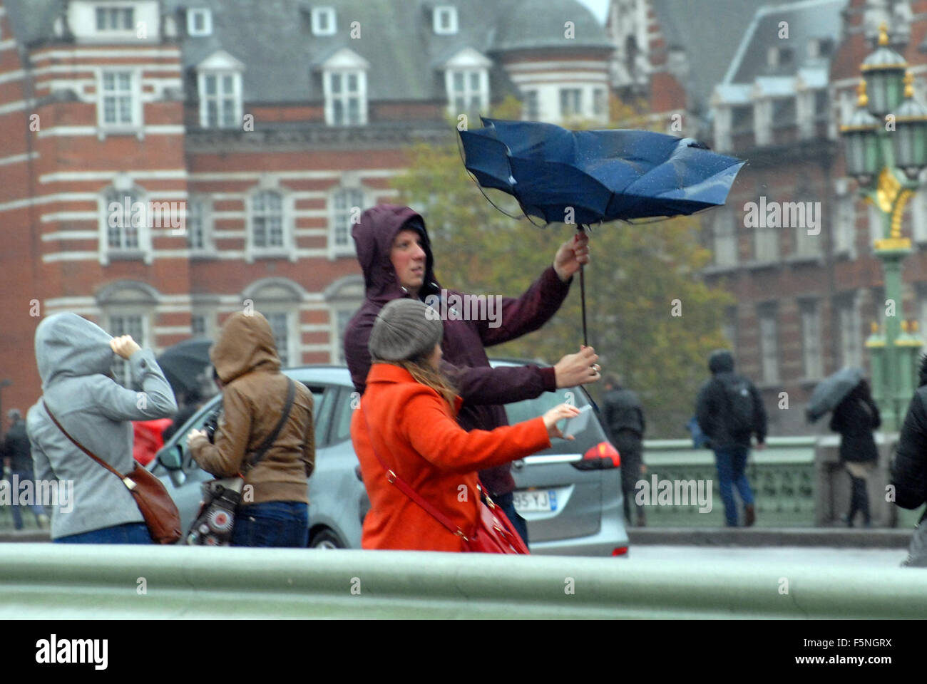 London, UK, 7 November 2015, People on Westminster Bridge. Wet and ...