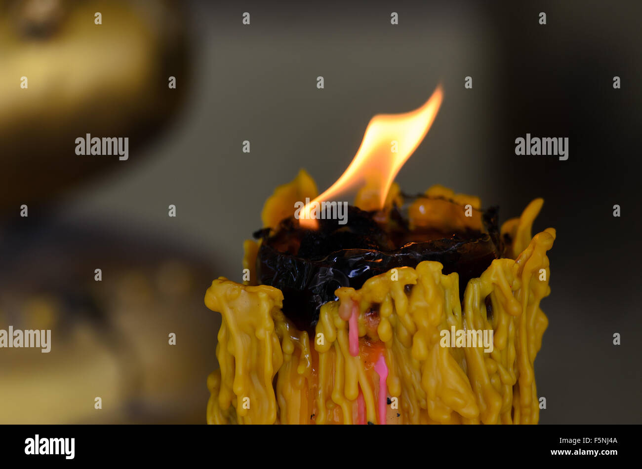 Candle flame burning bright. The image has been zoomed during exposure ...