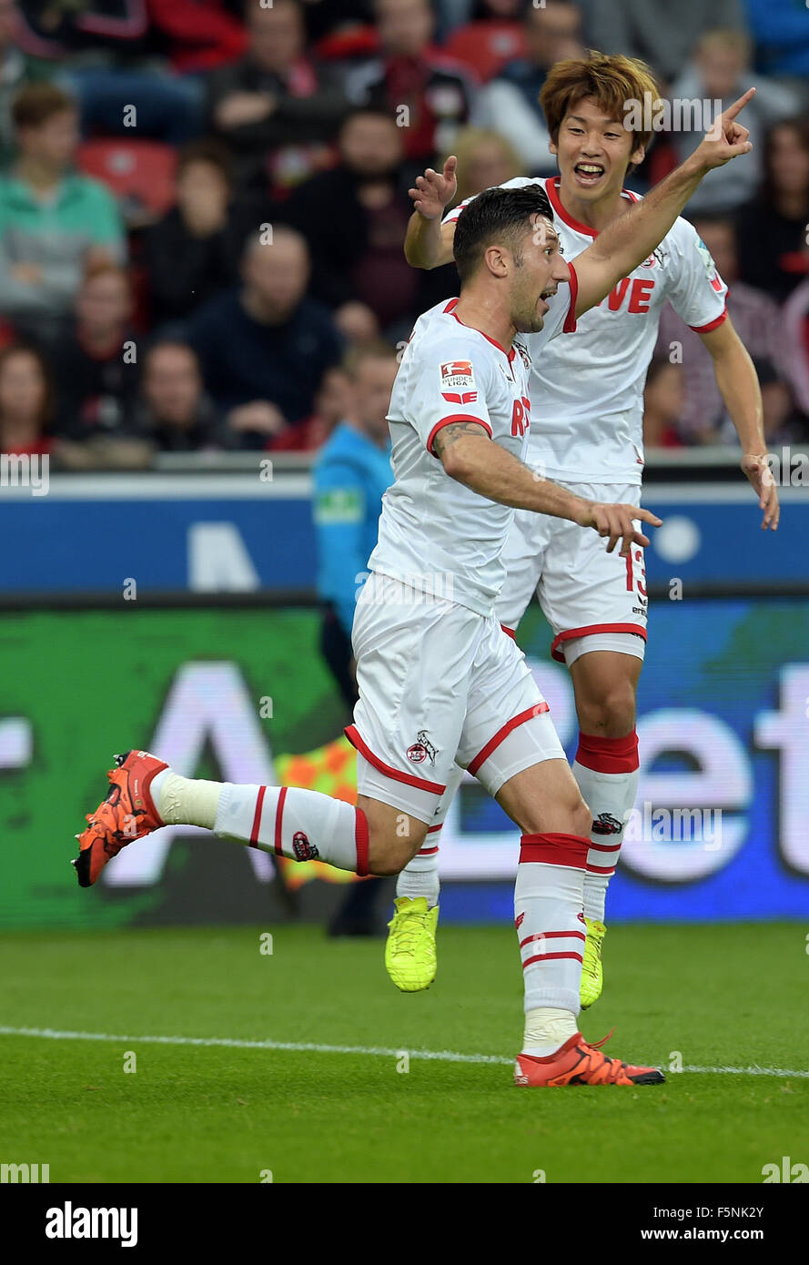 Leverkusen, Germany. 07th Nov, 2015. Koeln's Dominic Maroh (l) and Yuya ...