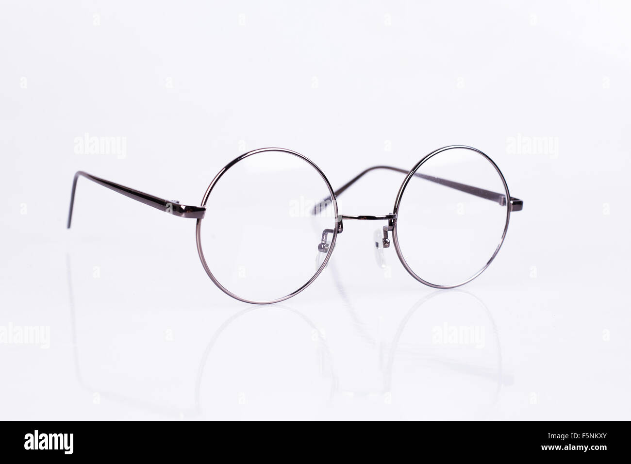 Round glasses hi-res stock photography and images - Alamy