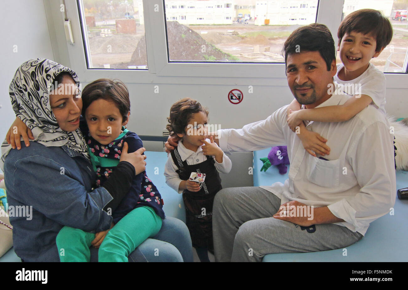 Halberstadt, Germany. 07th Nov, 2015. Afghan refugee family Ghazni sits ...