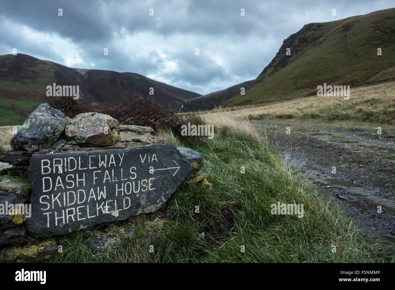 A slate sign post on the cumbrian way showing the way to dash falls ...