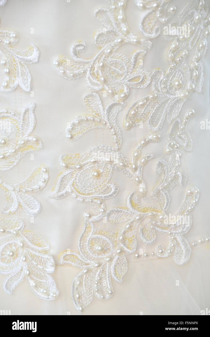 white wedding background (embroidery on cloth with beads Stock Photo ...