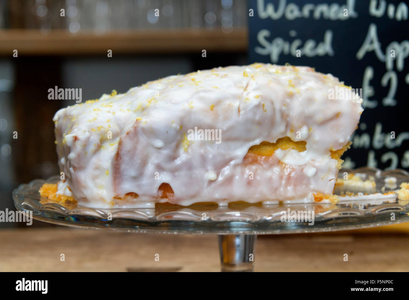 Lemon iced sponge cake Stock Photo - Alamy