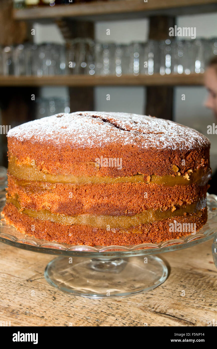 Decorated coffee sponge cake Stock Photo - Alamy