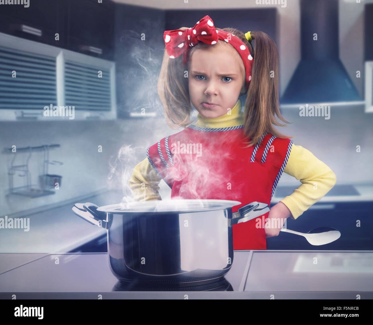 Child female cooking sad hi-res stock photography and images - Alamy