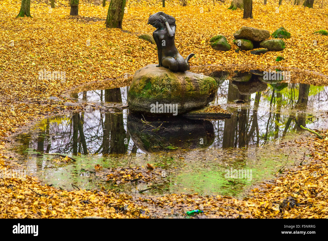 Mermaid Statue In The Park in Autumn Season Stock Photo - Alamy