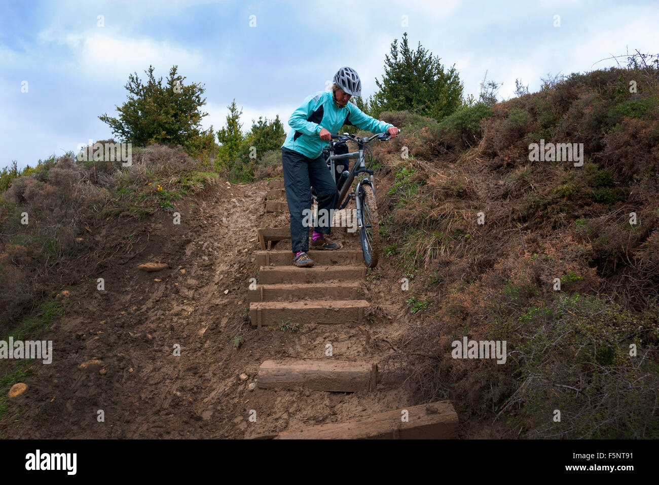 A cycling pilgrim struggles with part of the camino to Santiago de ...