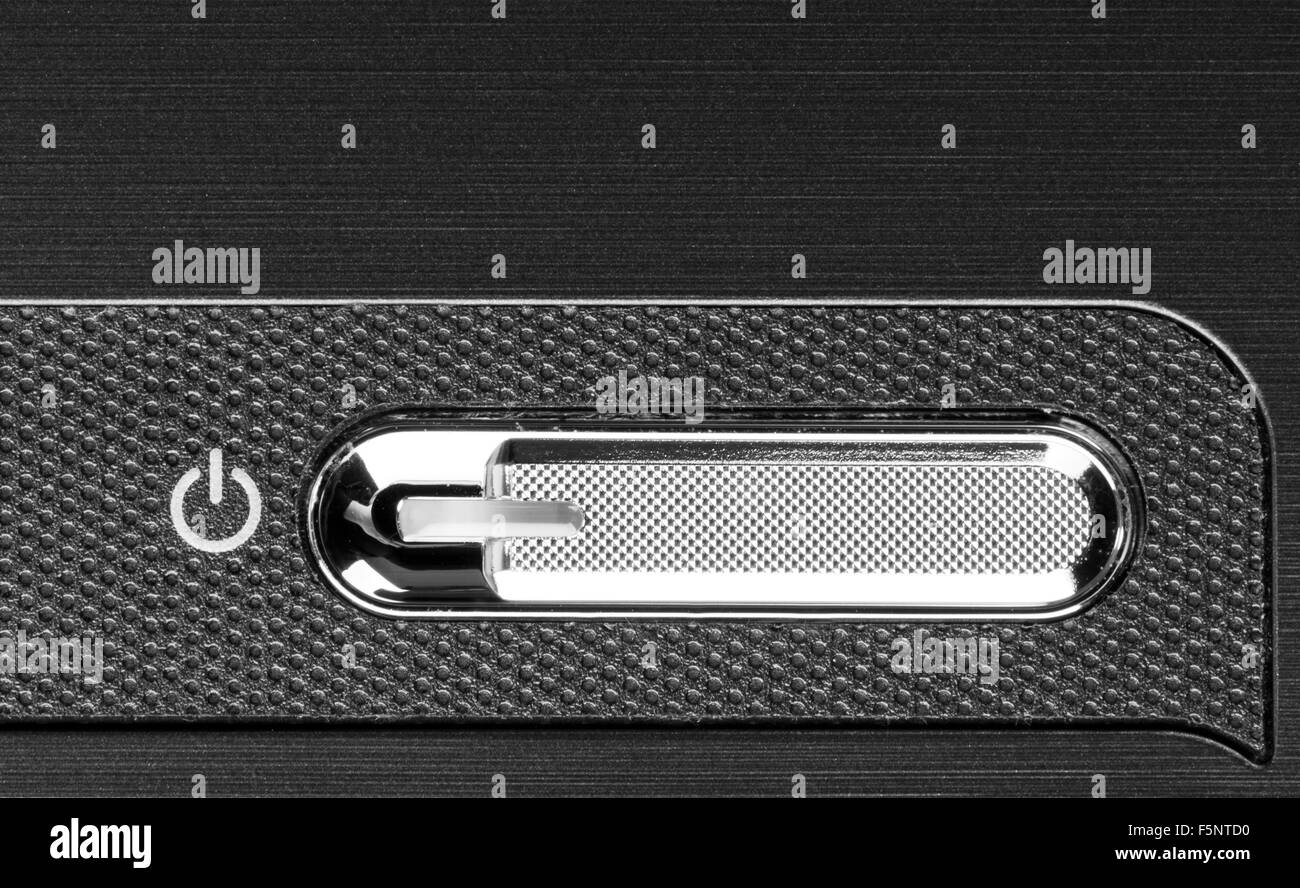 Close-up of power button on laptop Stock Photo - Alamy