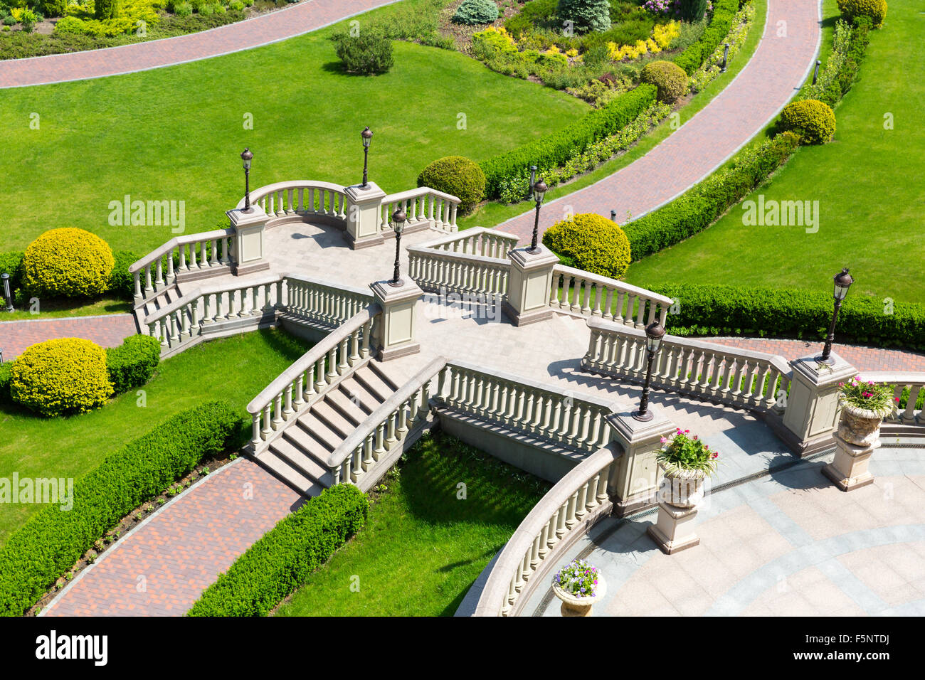 Up view of original stone stairs in the green park Stock Photo - Alamy