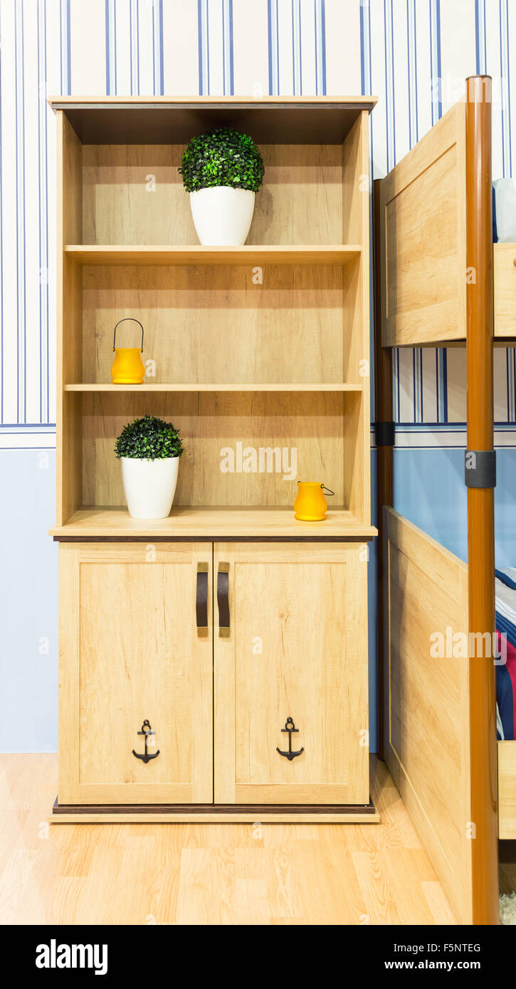 Beautiful light wooden cupboard in children's room Stock Photo - Alamy