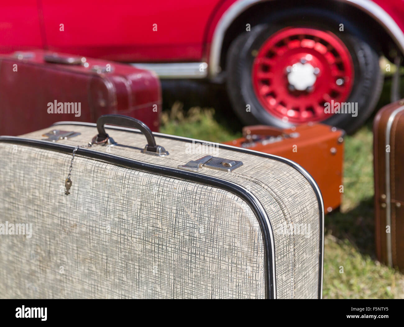 Vintage suitcases on the grass hi-res stock photography and images - Alamy