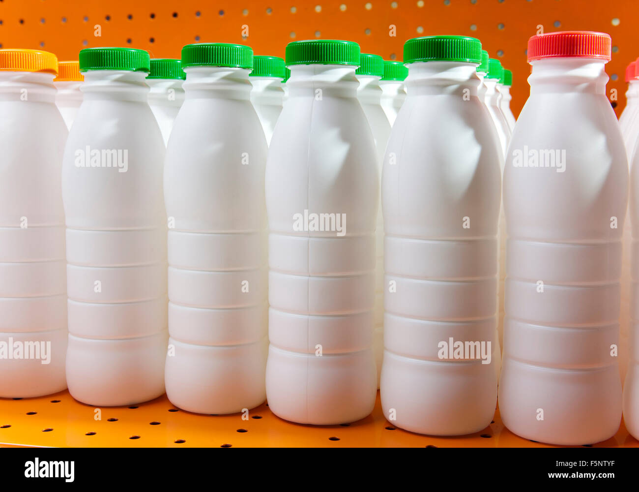 Bottles of milk on a shelf hi-res stock photography and images - Alamy