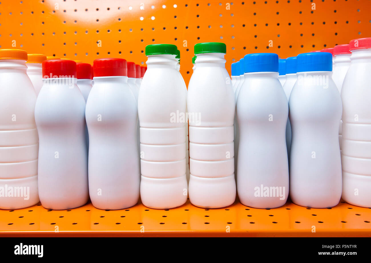 Bottles of milk on a shelf hi-res stock photography and images - Alamy
