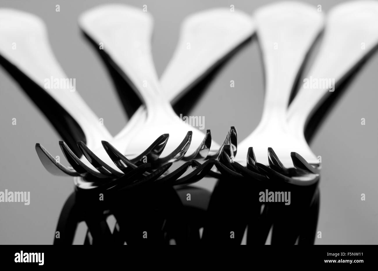 Group of silver forks. Close-up view Stock Photo - Alamy