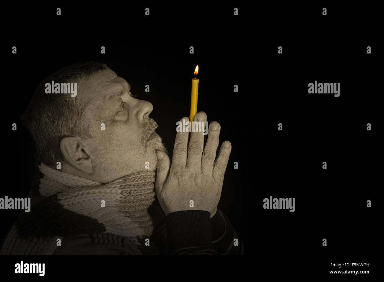nice portrait of senior man with a candle Stock Photo - Alamy