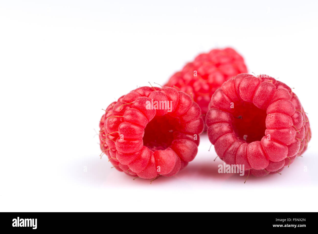 Fresh raspberry isolated on a white background Stock Photo - Alamy