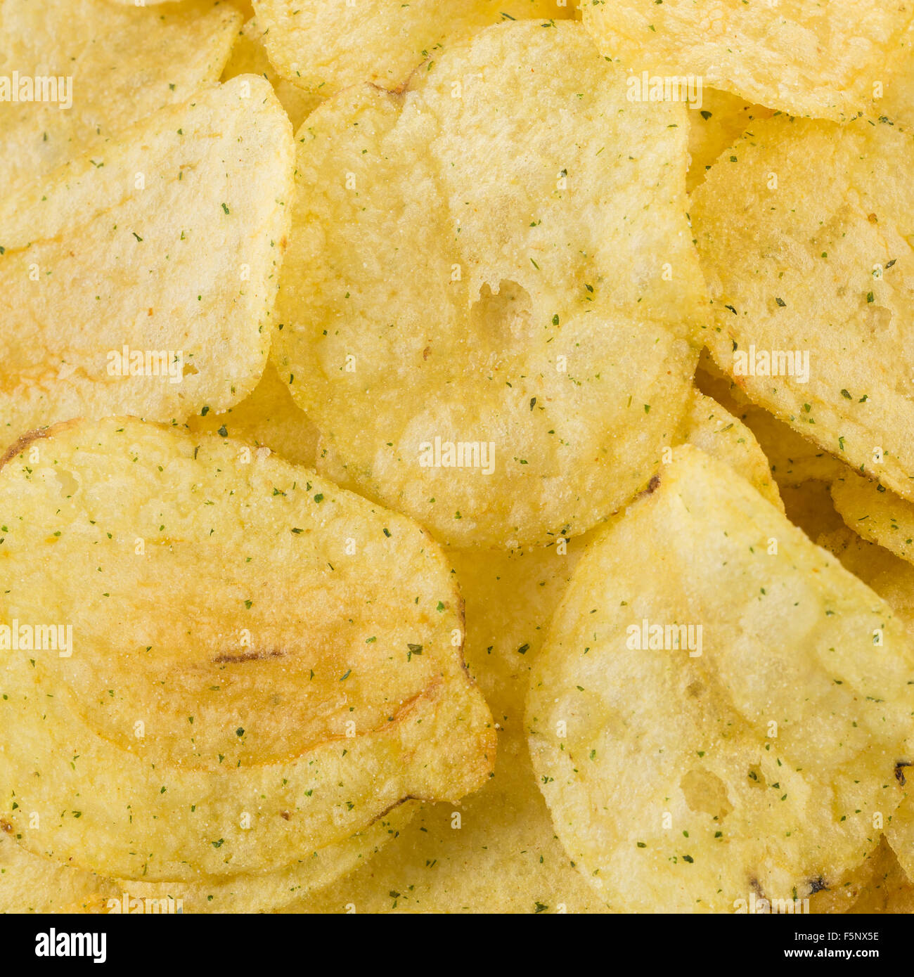 Prepared potato chips snack closeup viewas a background Stock Photo - Alamy