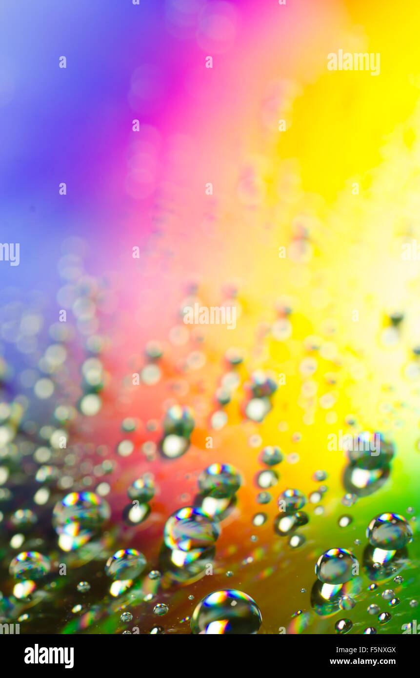 waterdrops on rainbow colors background selective focus Stock Photo - Alamy