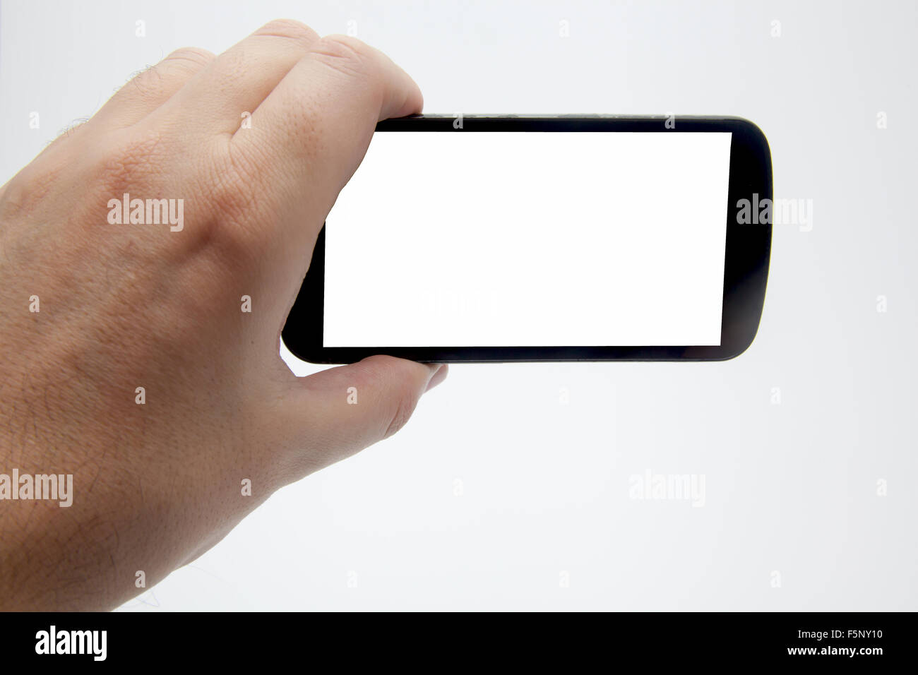 Hand holding a phone to capture photo hi-res stock photography and ...