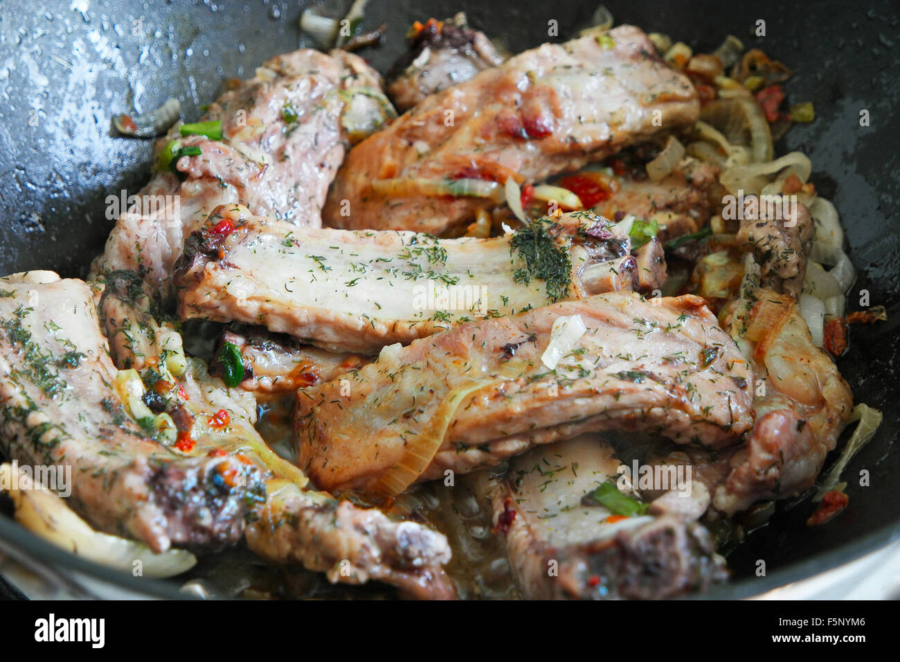 Pork ribs in pan Stock Photo - Alamy