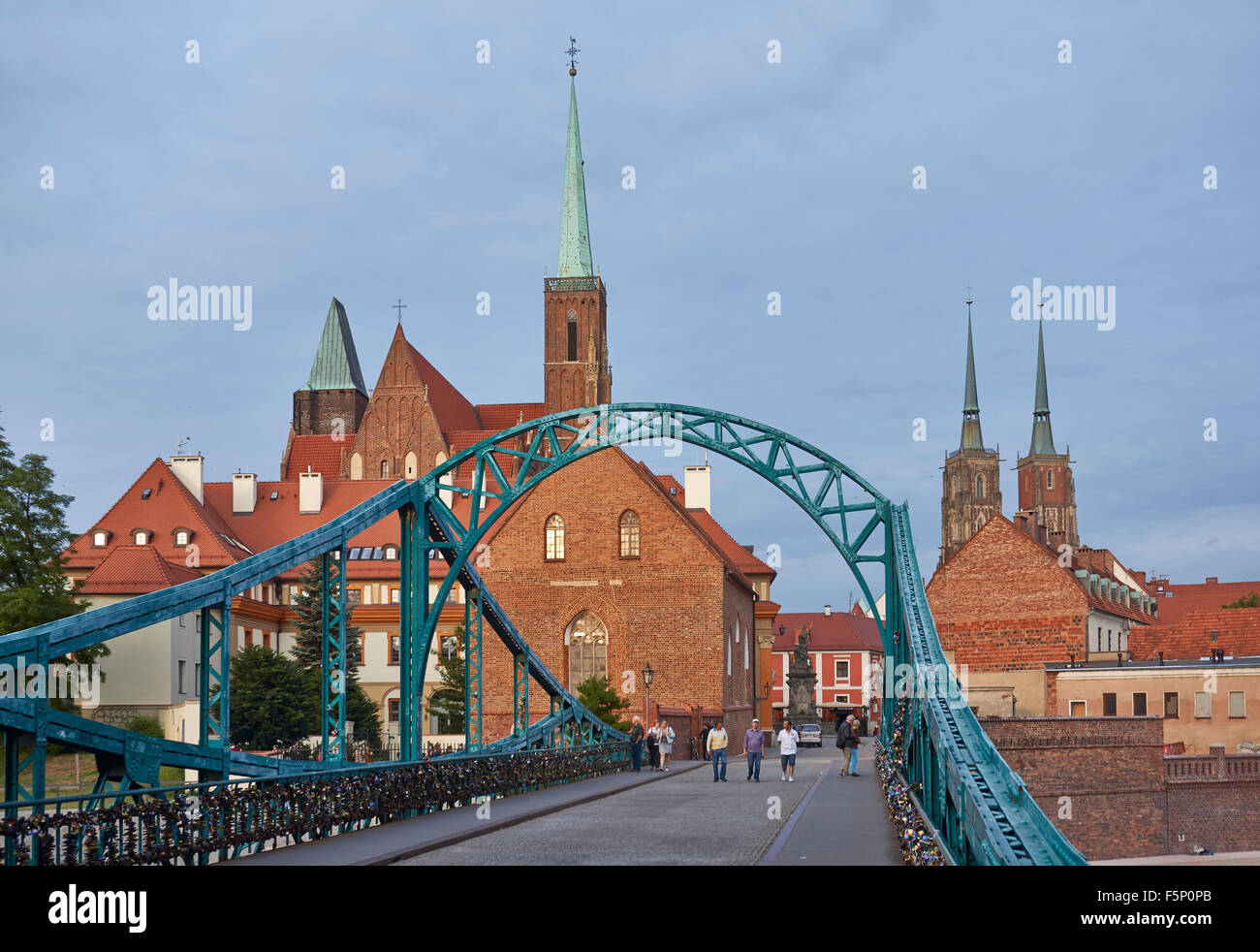 Tumski Bridge, connecting old town and Sand Island of Wroclaw with Cathedral Island or Ostrow ...