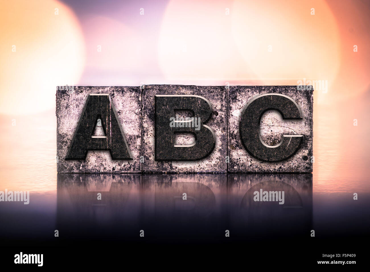 The letters "ABC" written in vintage ink stained letterpress type Stock ...