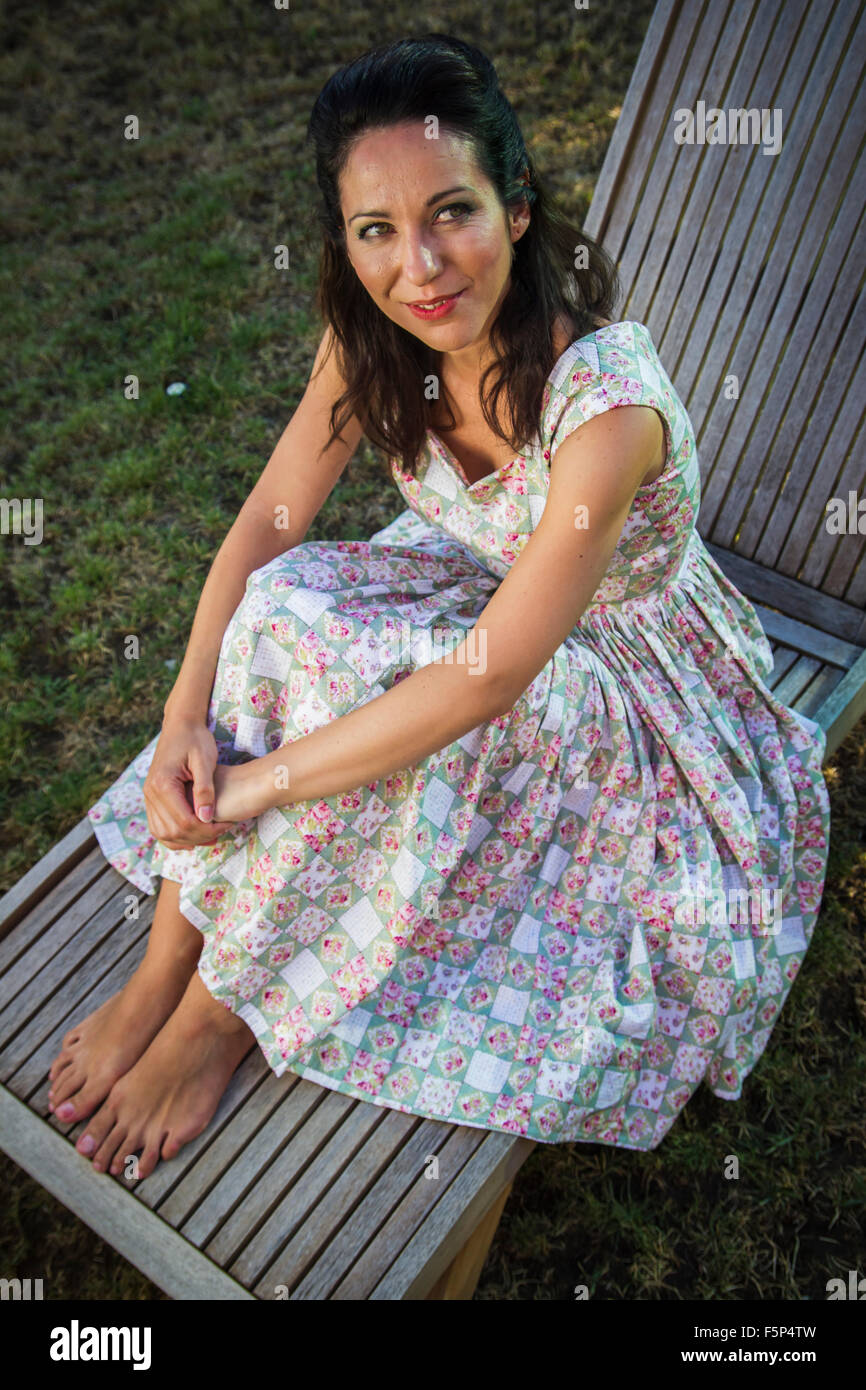 Woman gardening. Mature girl gardening in her backyard. spring season ...